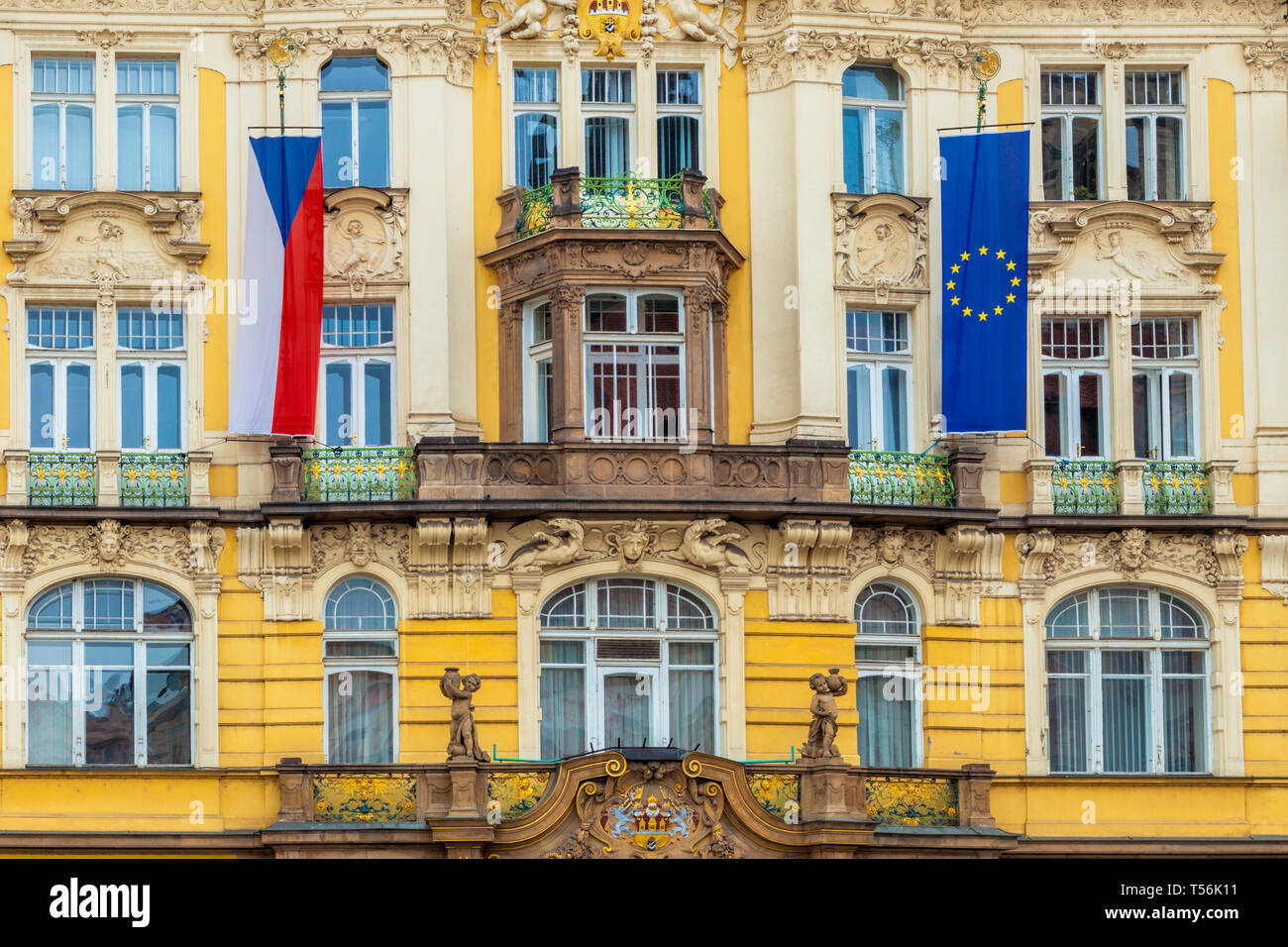 Prague facade and flags of the Czech Republic and the European Union ...