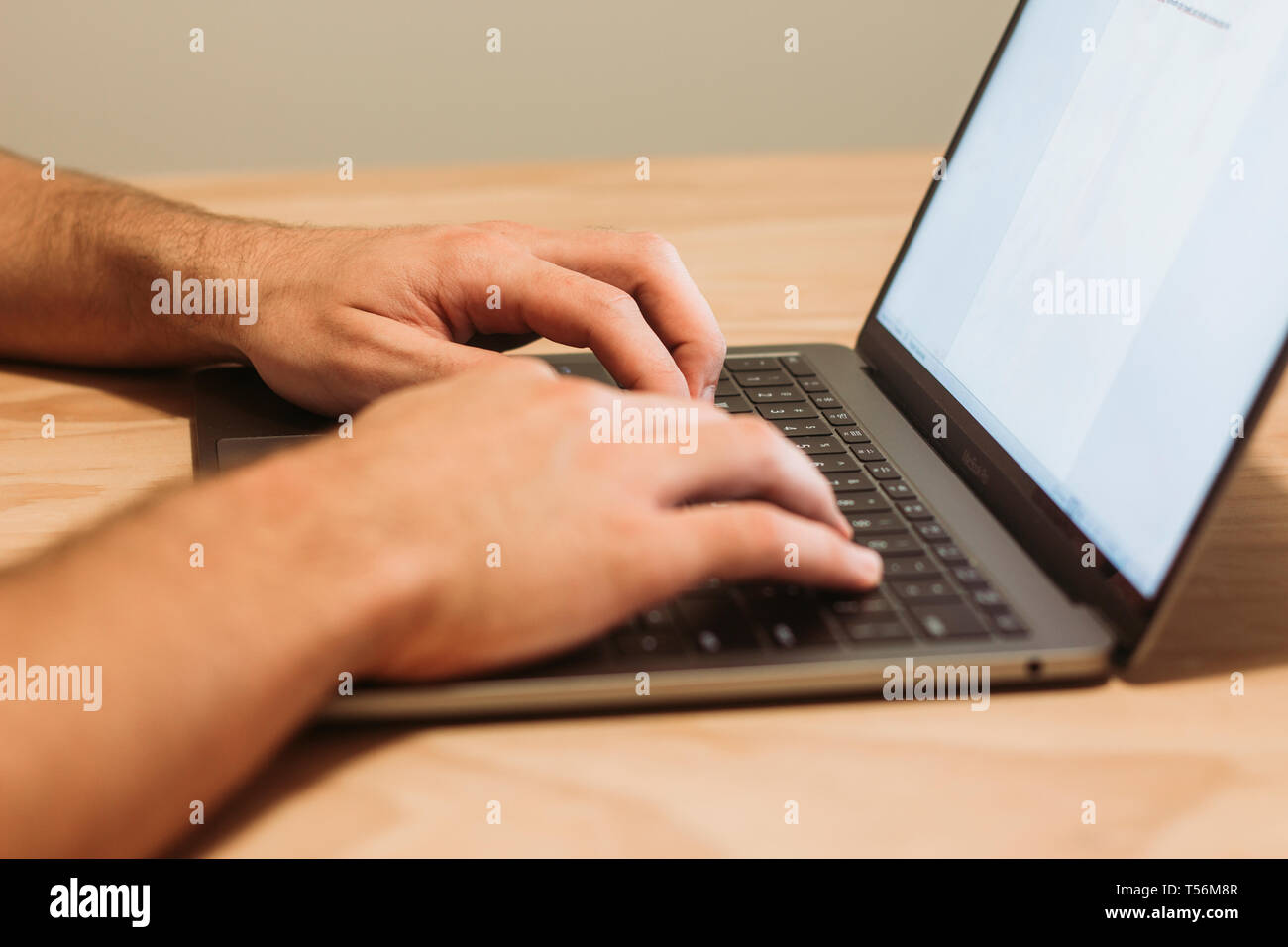 Typing on a keyboard Stock Photo - Alamy
