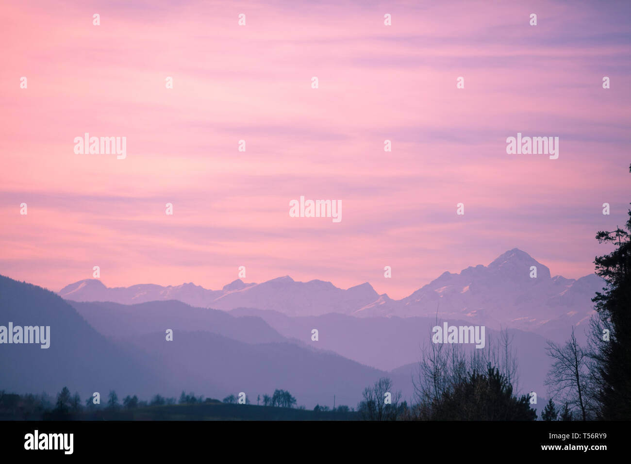 Mountain range in the early morning. Sunrise in mountains Stock Photo ...