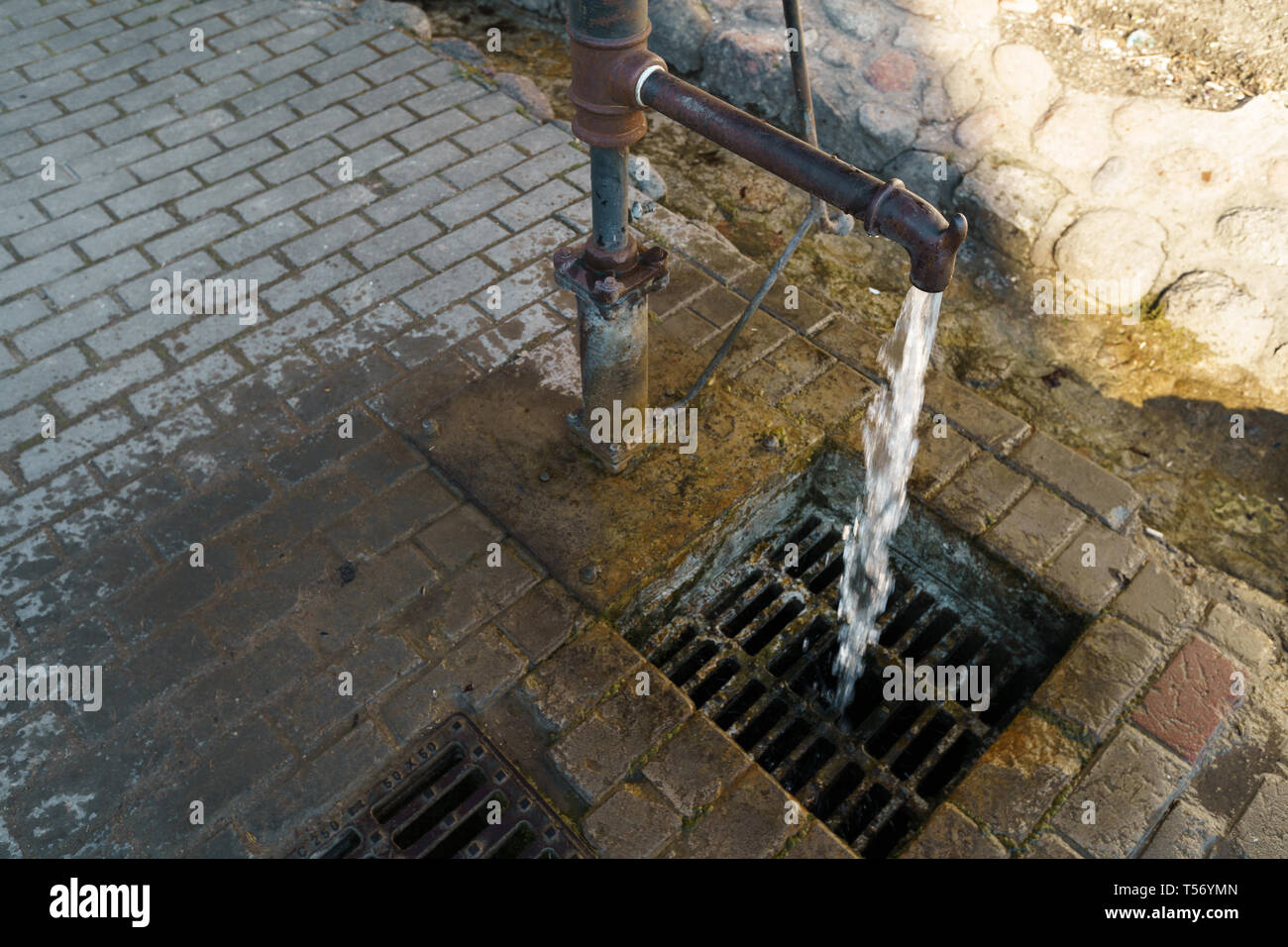 City water pump with running drink water for people Stock Photo - Alamy