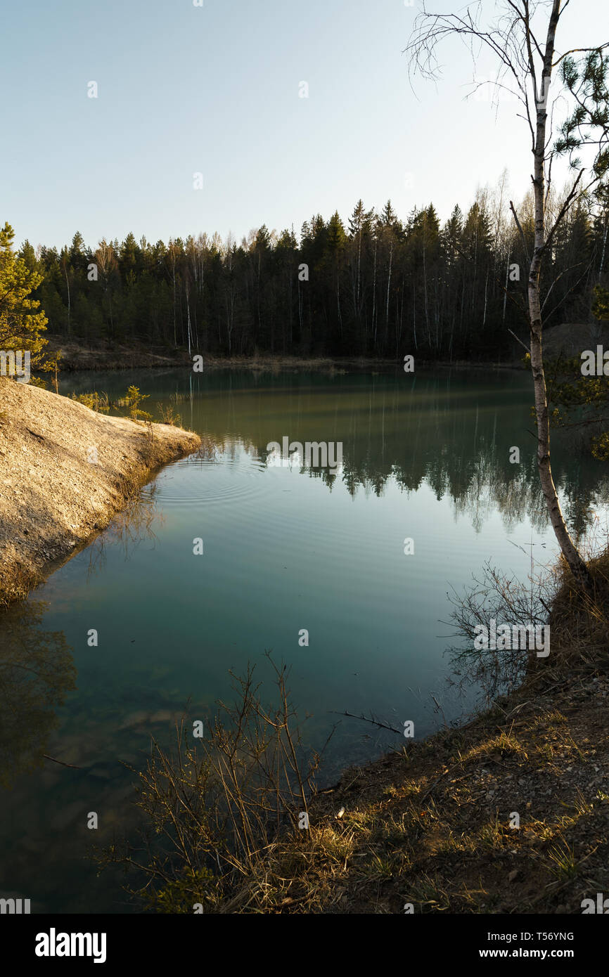 Beautiful turquoise lake in Latvia - Meditirenian style colors in ...