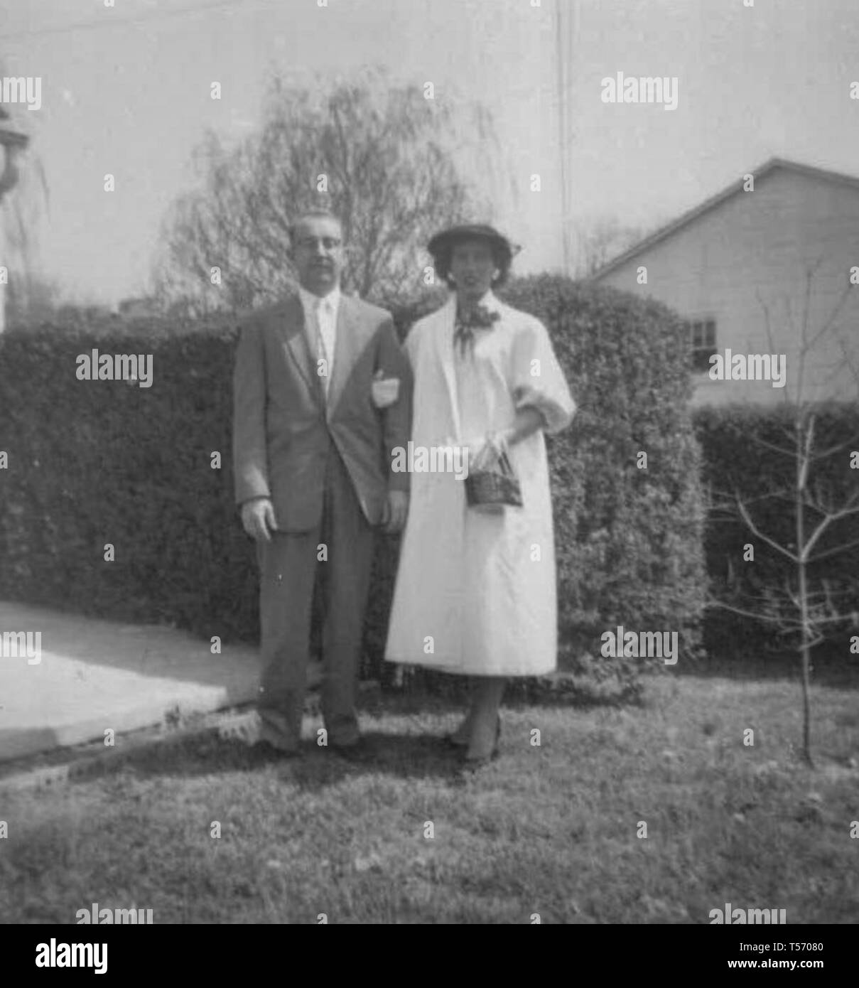 A couple poses in their best Sunday clothes before Easter Sunday church ...
