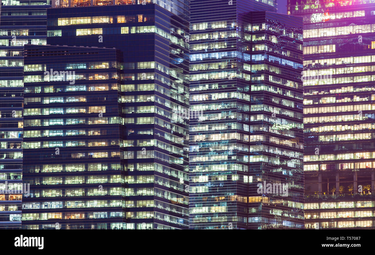 background of skyscrapers windows at night Stock Photo - Alamy