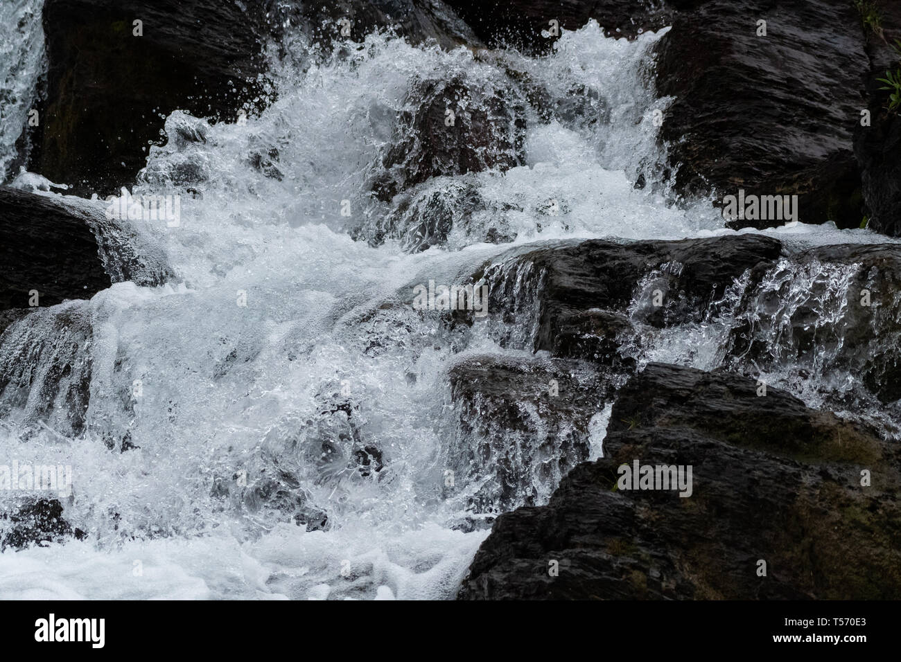 Fast moving water over rocks hi-res stock photography and images - Alamy