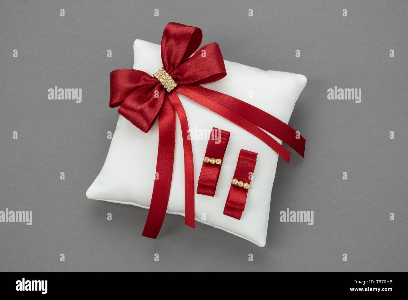 Gold Wedding Rings Red Ribbon High Resolution Stock Photography and ...