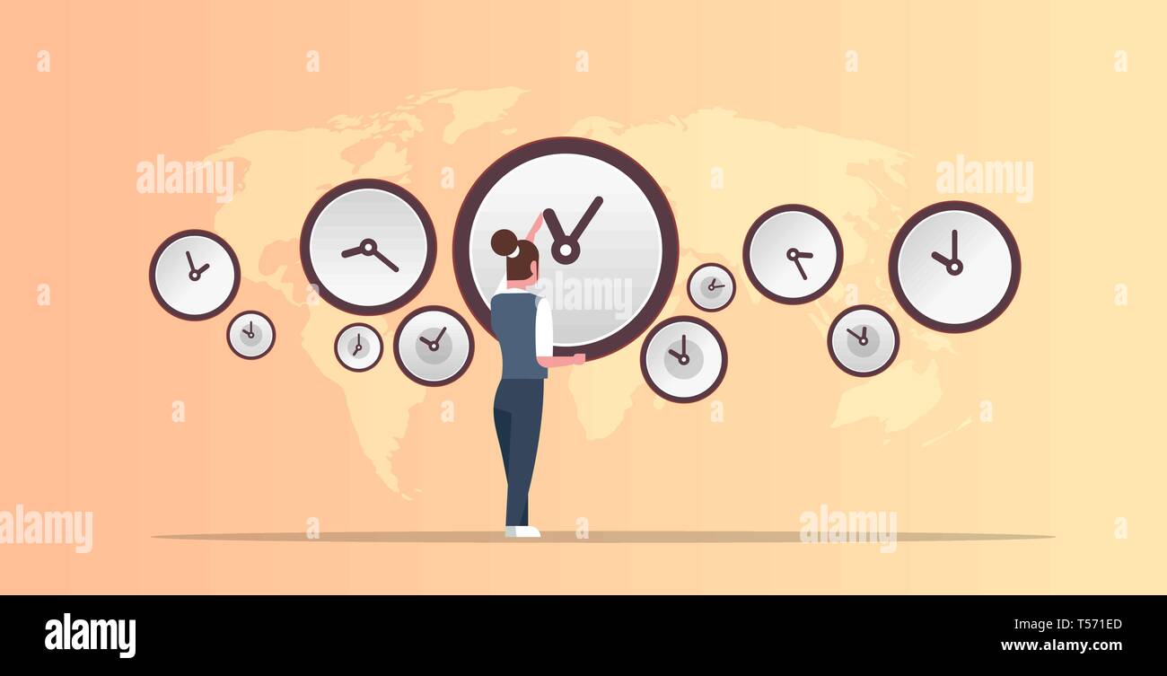 businesswoman pointing on wall with clocks different cities time ...