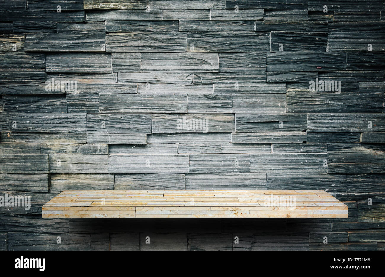 yellow stone rock shelf counter on gray rock layer for product display ...