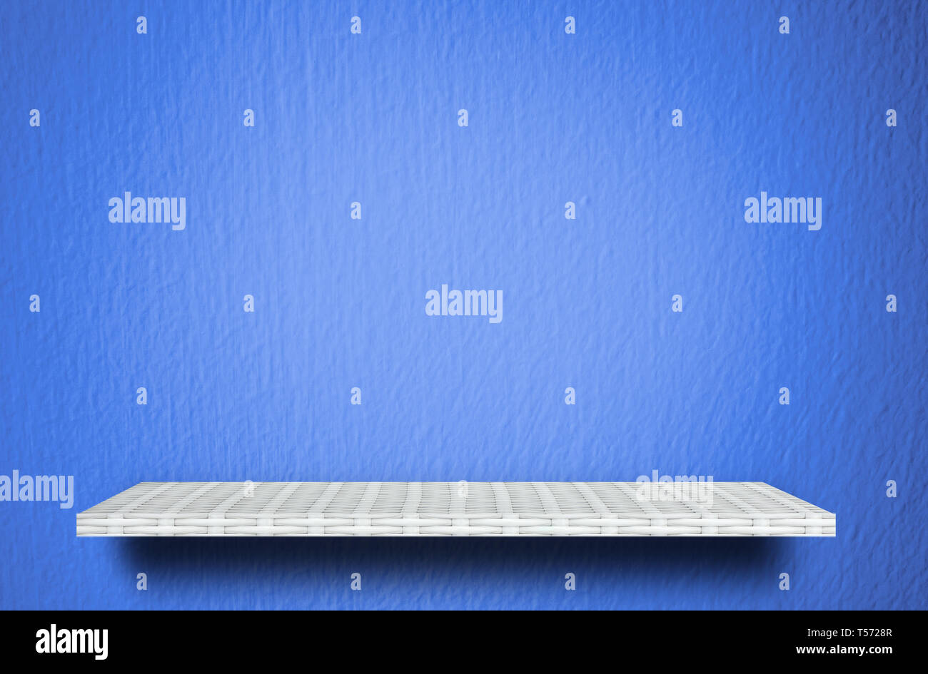 Empty white shelf on blue cement background for product display Stock ...