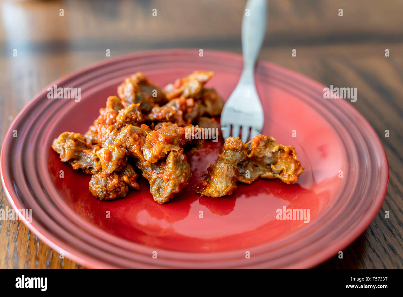 Nigerian Spicy Chicken Gizzard in Pepper Sauce Stock Photo - Alamy