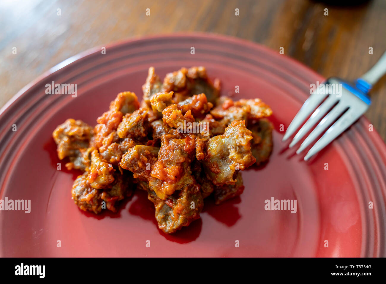 Nigerian Spicy Chicken Gizzard in Pepper Sauce Stock Photo - Alamy