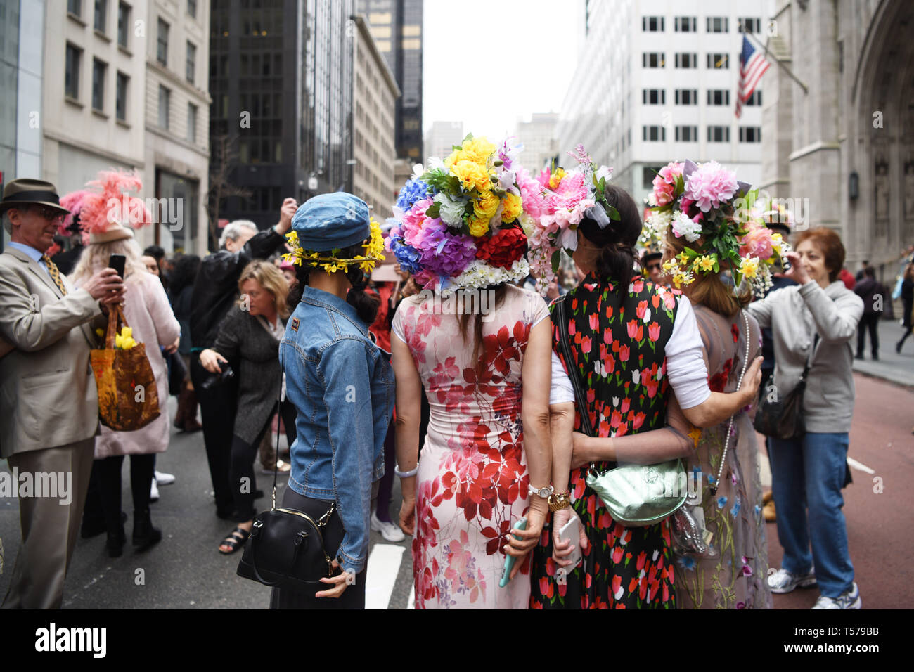 New York, USA. 21st Apr, 2019. Revelers with creative hats pose for ...