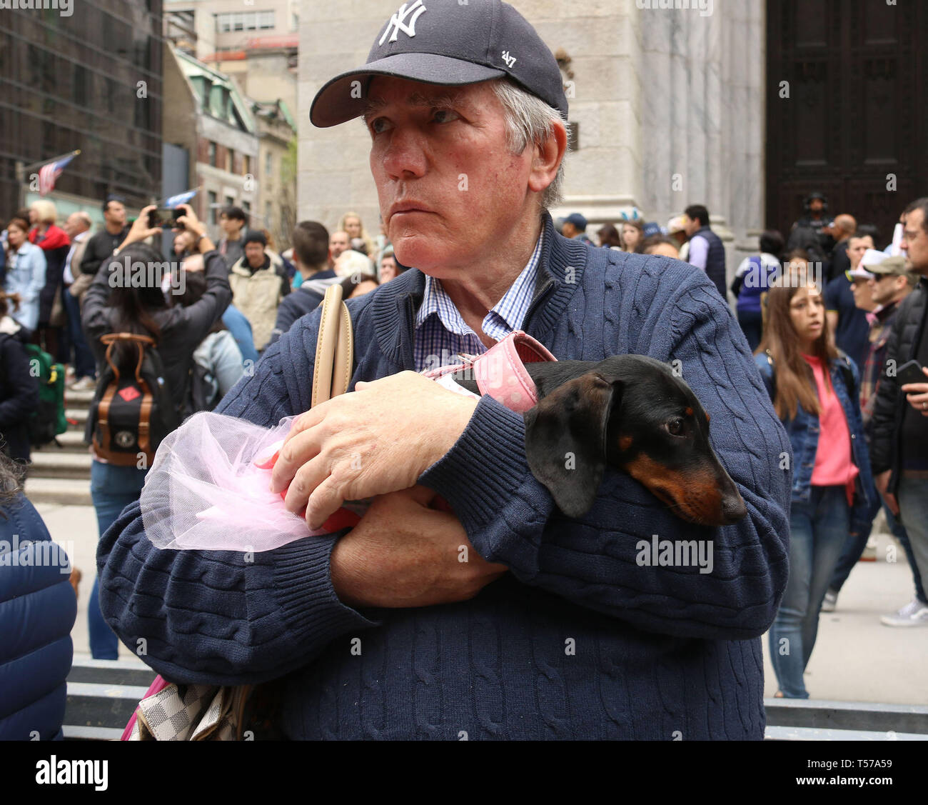 April 21, 2019 - New York City, New York, U.S. - A Parade goer holds a ...
