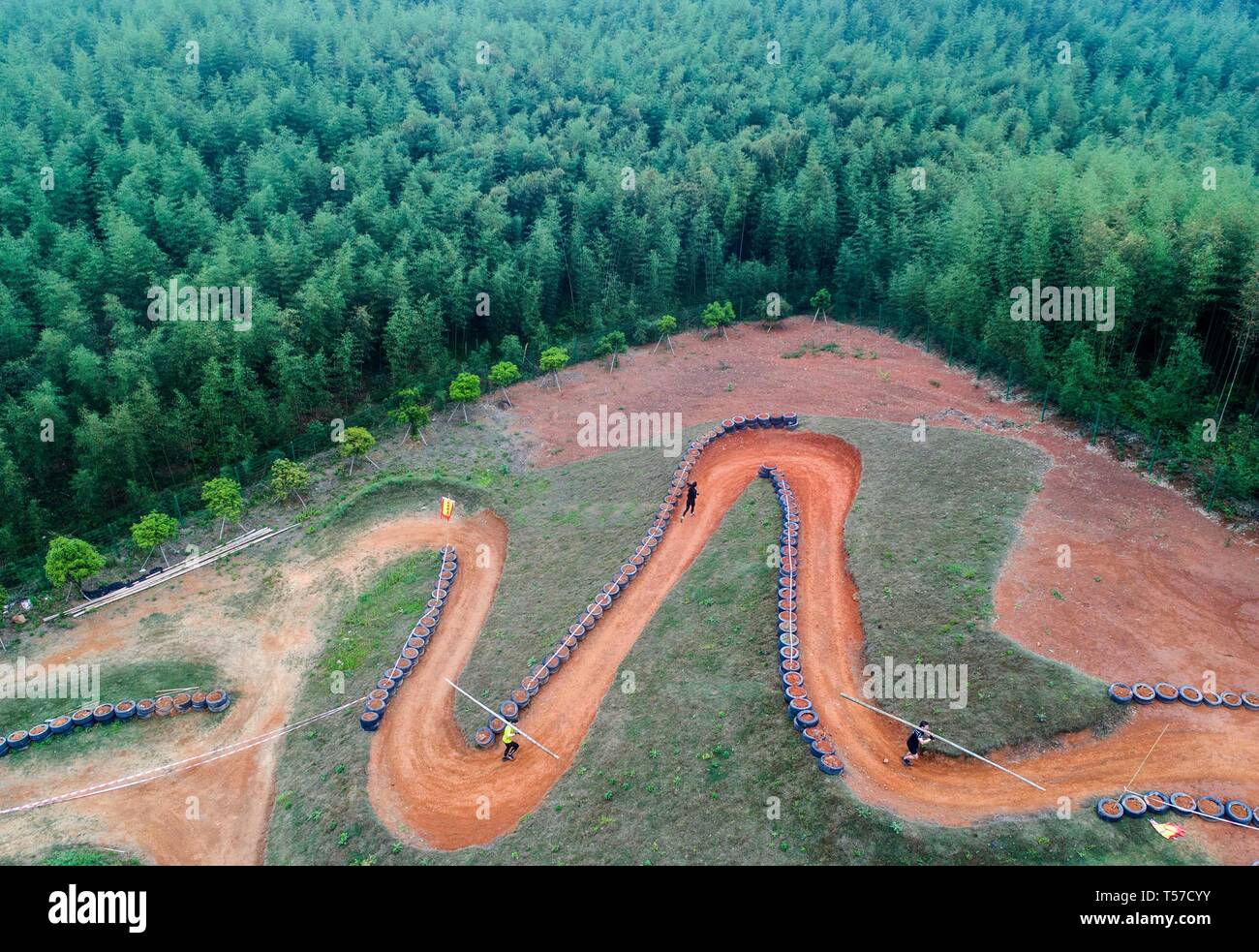 Beijing, China's Zhejiang Province. 21st Apr, 2019. People take part in ...