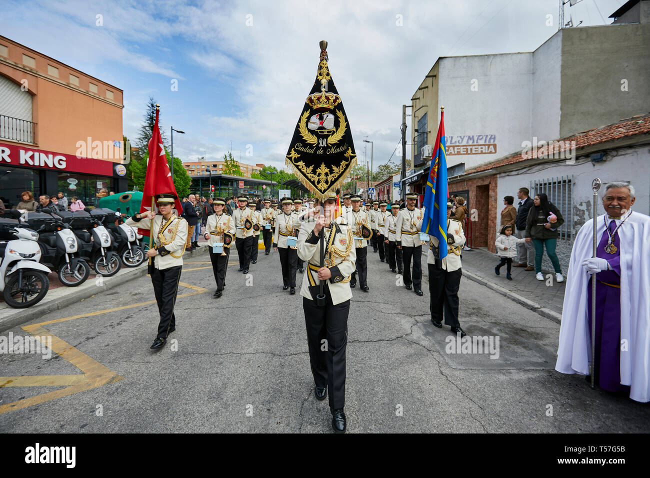 Marching band with flags seen during the traditional procession of ...