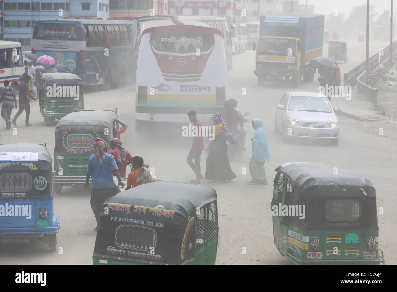 April 22, 2019 - Dhaka, Bangladesh - Bangladeshi people walk along a ...