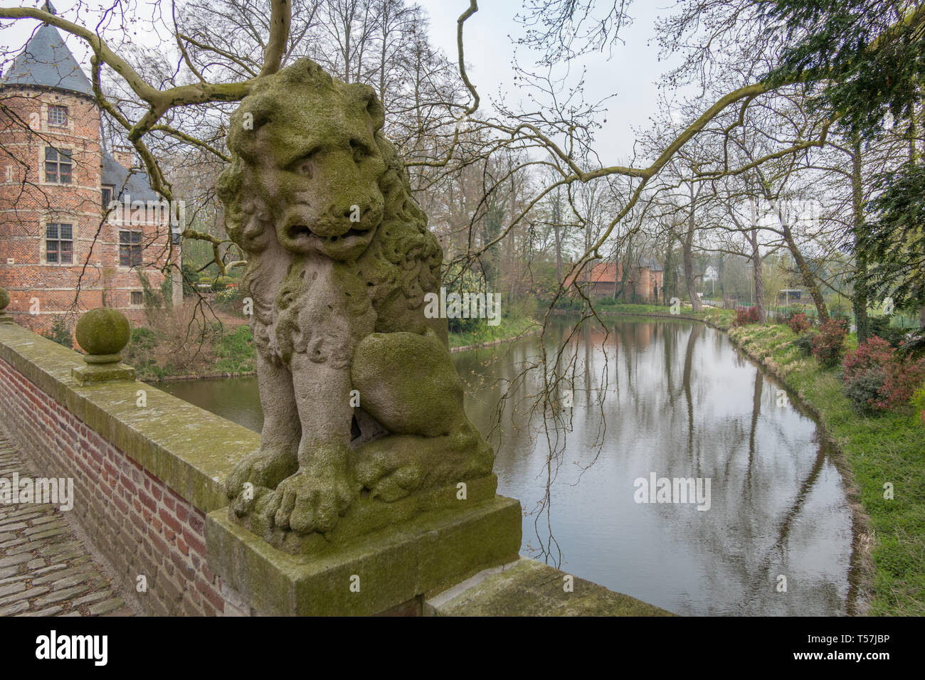 Lion statuette at the castle of Grand Bigard Stock Photo - Alamy