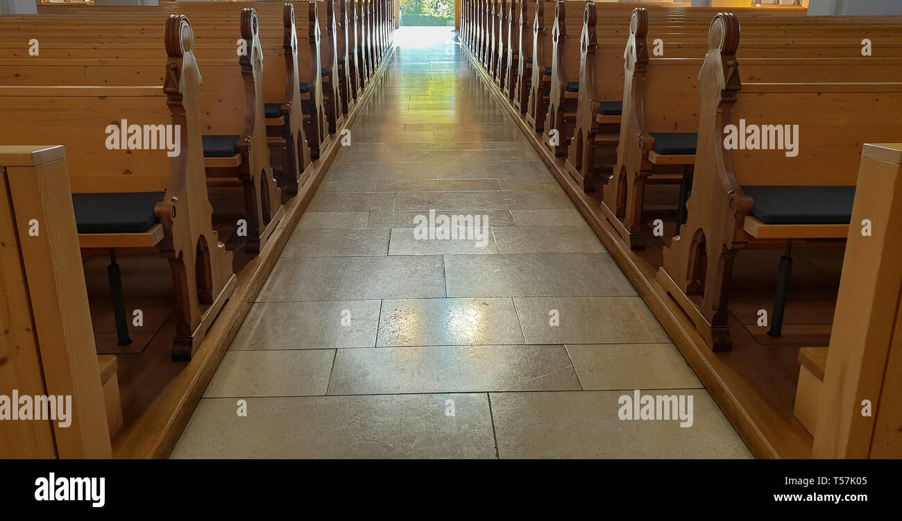 Empty church bench also called wooden pew without people Stock Photo ...