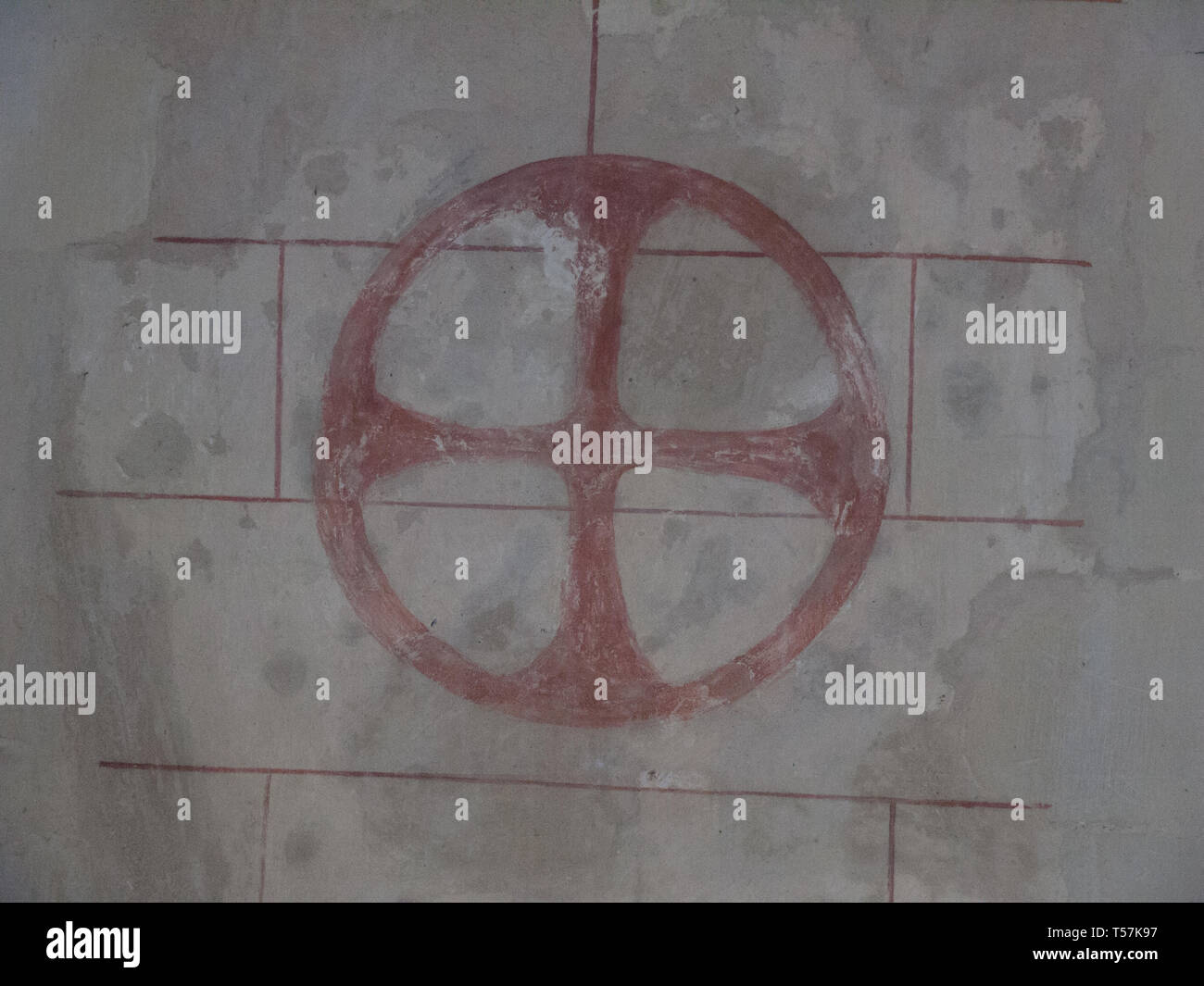 Old red circle and cross knights templar symbol wall church; Bures ...