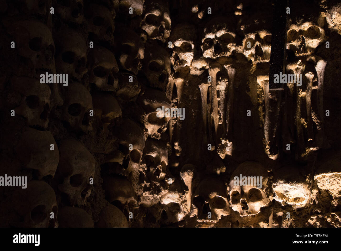 A Creepy Wall of Human Skulls in Portugal's Chapel of Bones in Evora ...