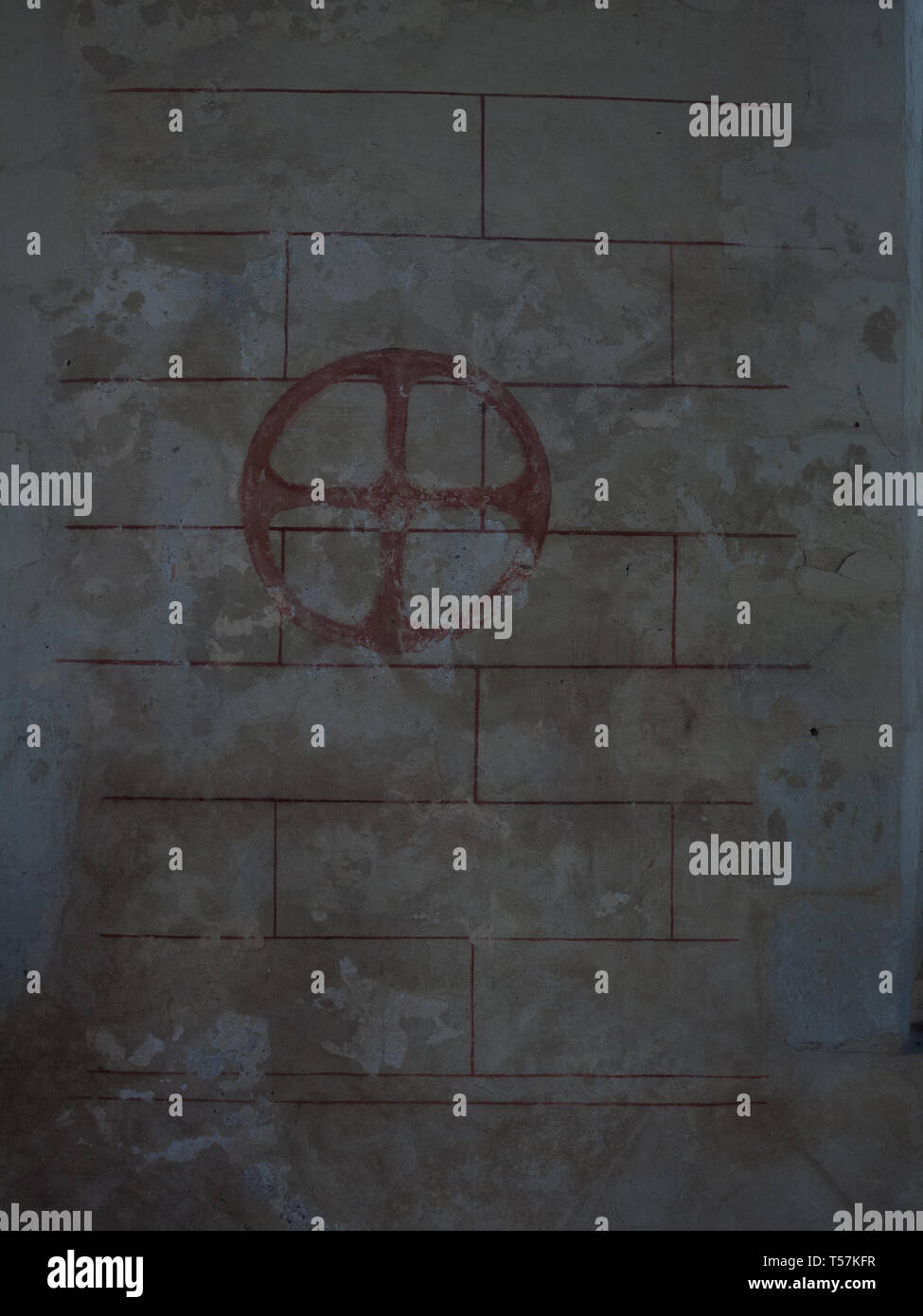 Old red circle and cross knights templar symbol wall church; Bures ...