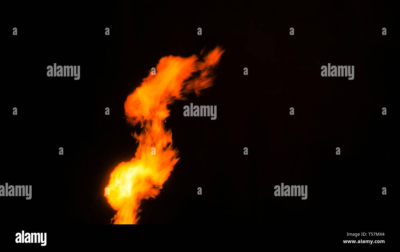 Flame jet, streams of flame on black background at night Stock Photo ...
