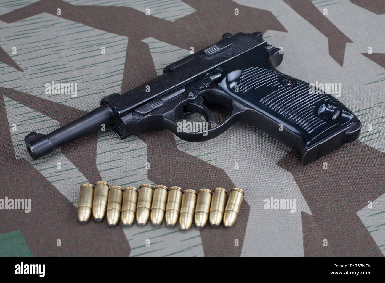 WWII era nazi german army 9 mm semi-automatic pistol with ammunition on ...