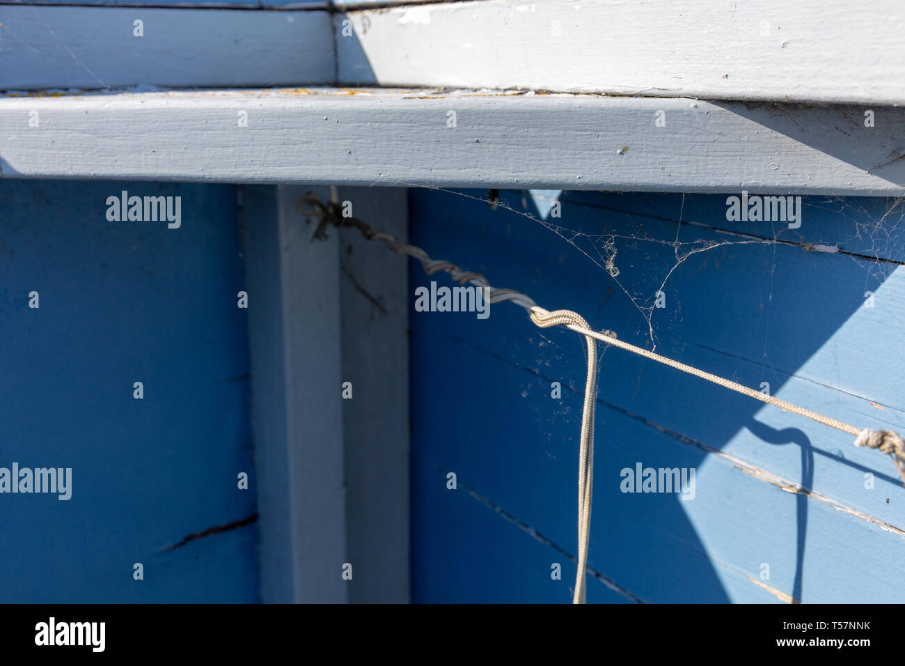 A washing line in a beach hut Stock Photo - Alamy