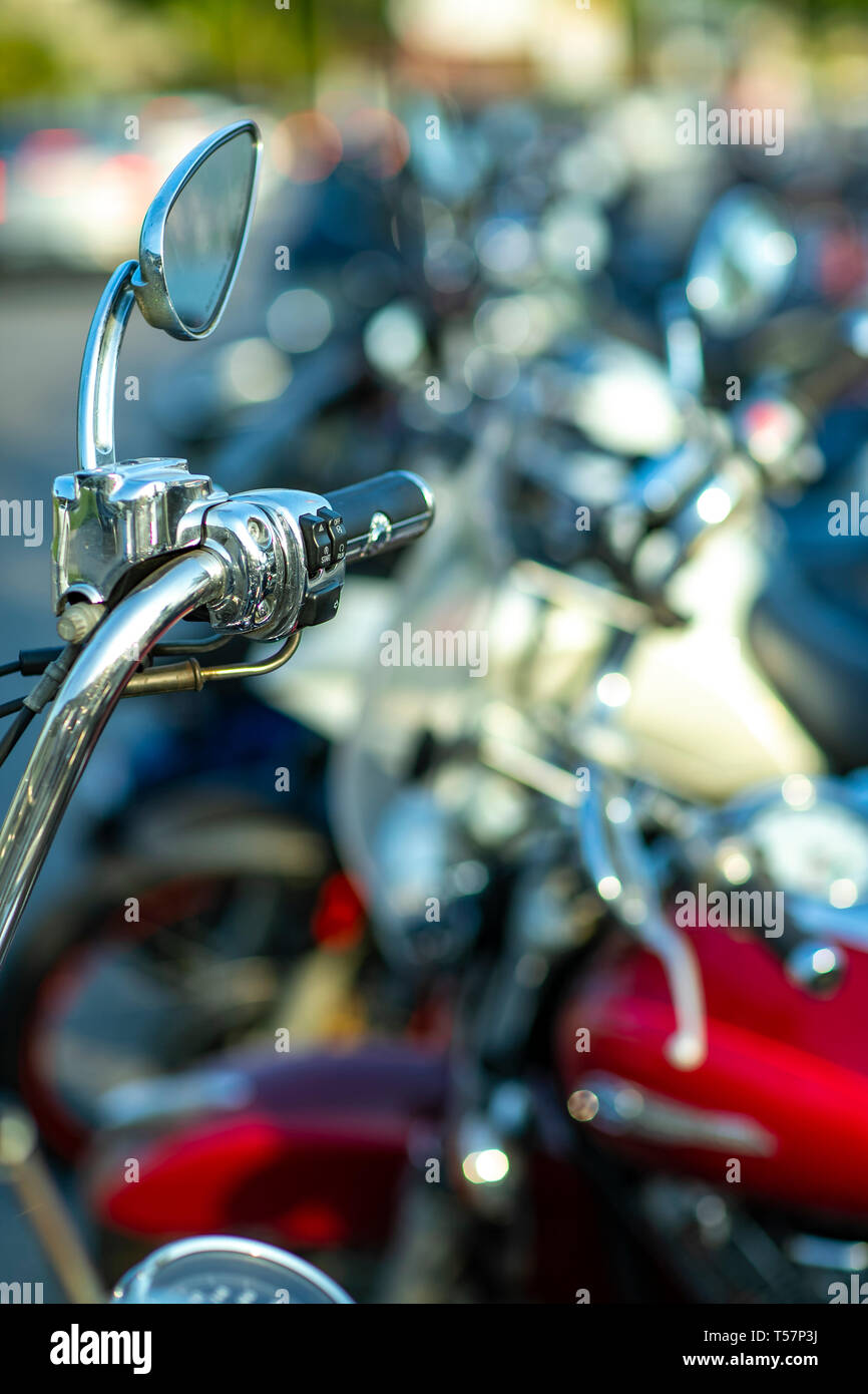 The chromed handlebar of a motorcycle. View of motorcycle handlebar in ...