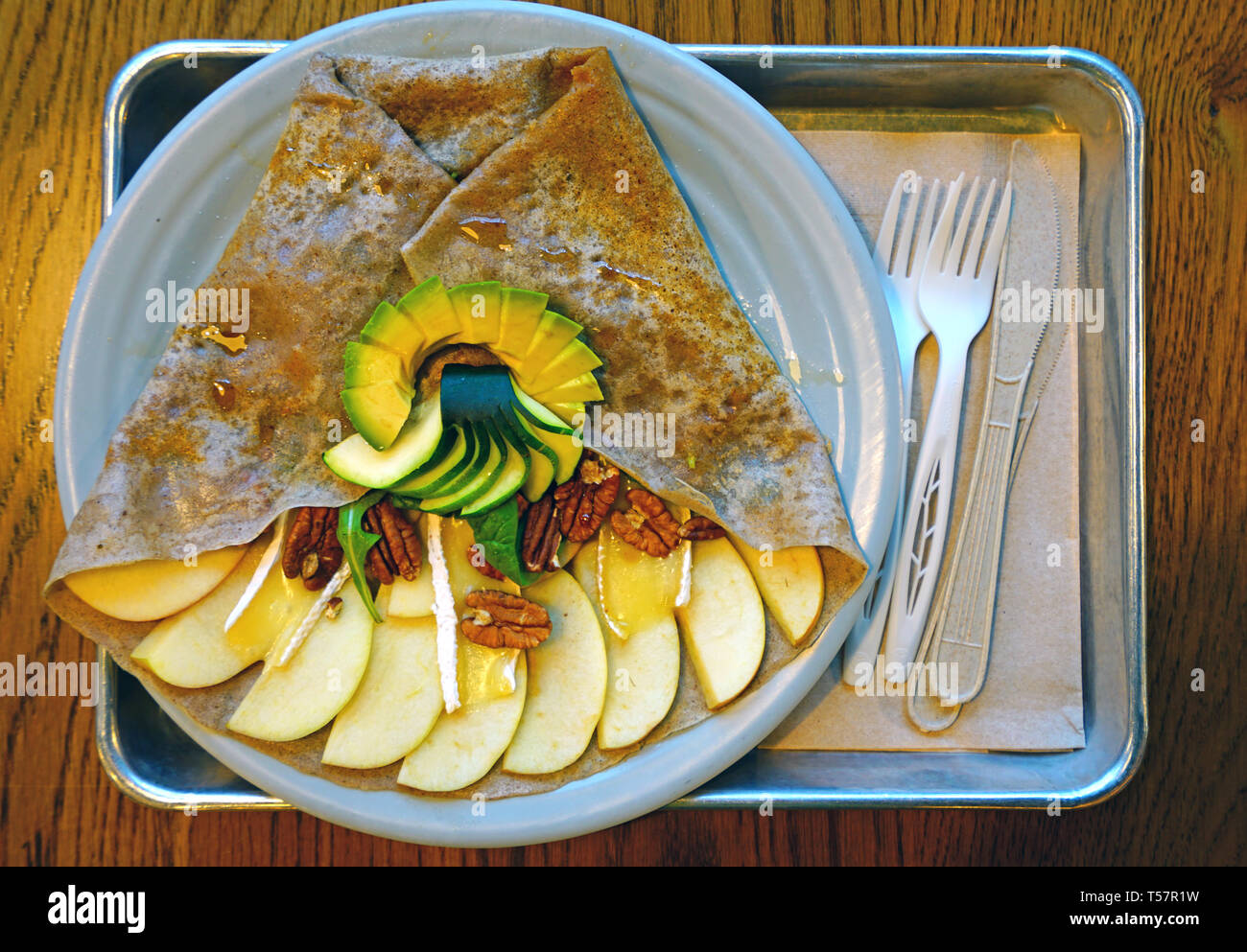 Savory crepe with apple, brie cheese and avocado Stock Photo - Alamy
