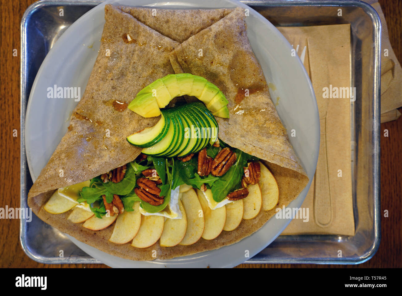 Savory crepe with apple, brie cheese and avocado Stock Photo - Alamy