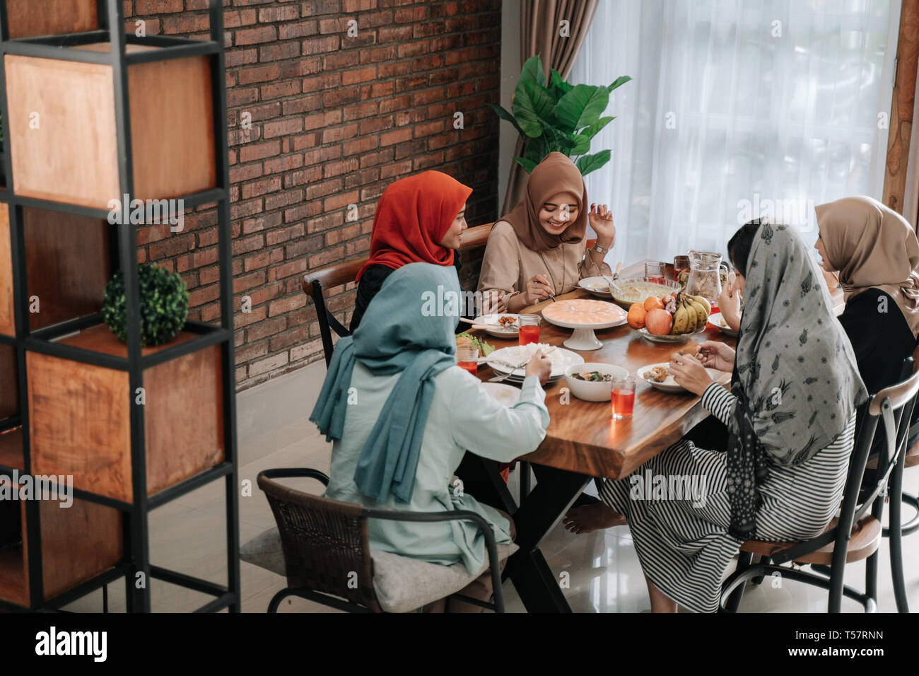 muslim people having dinner break fasting together Stock Photo - Alamy