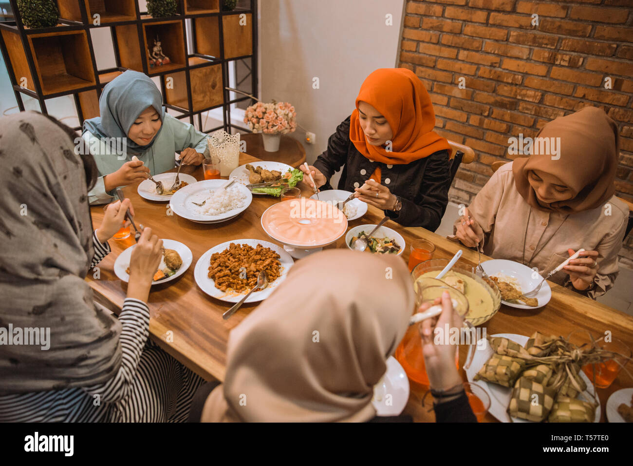 muslim people having dinner break fasting together Stock Photo - Alamy