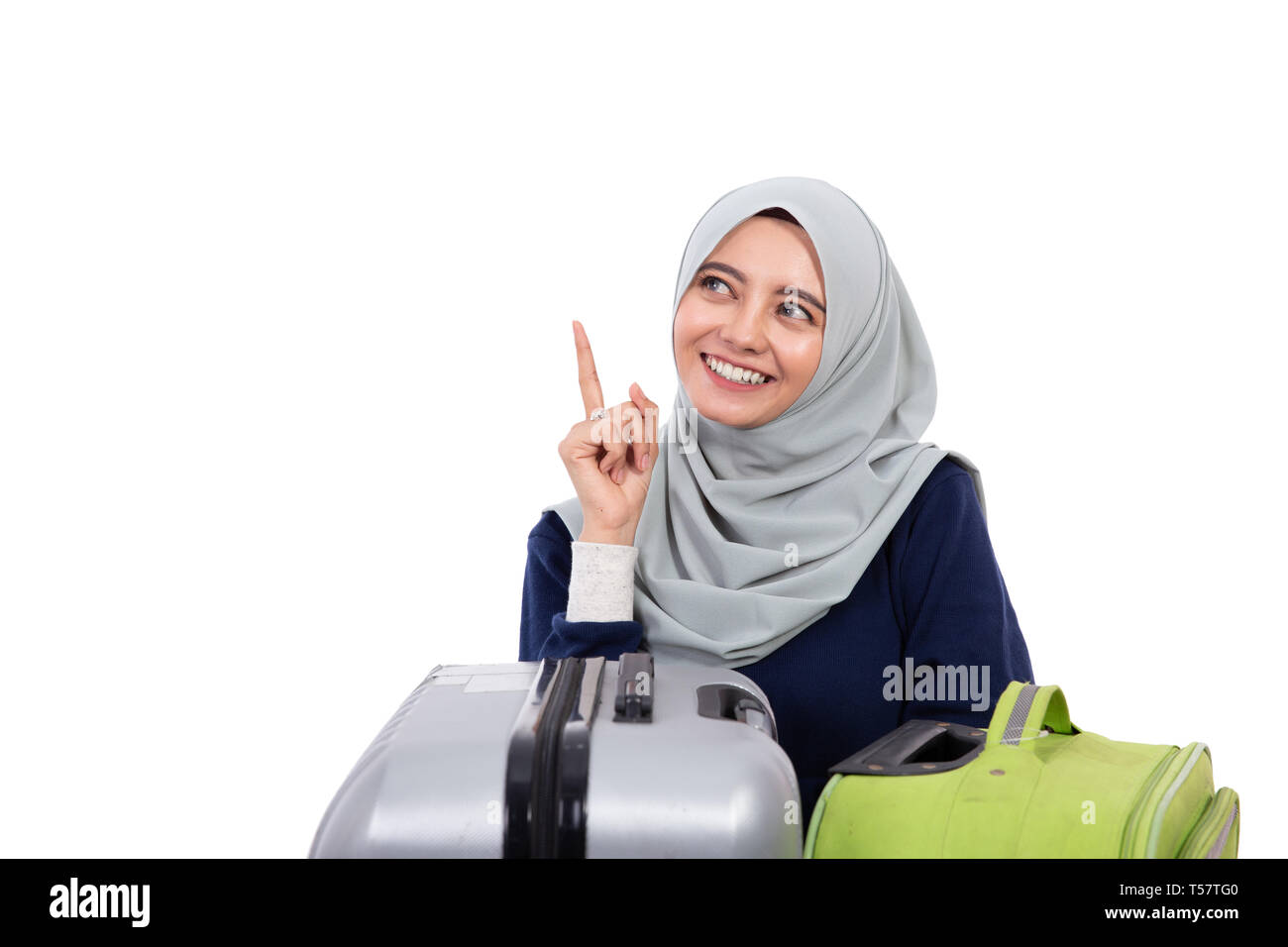 muslim woman with hijab pointing up Stock Photo - Alamy