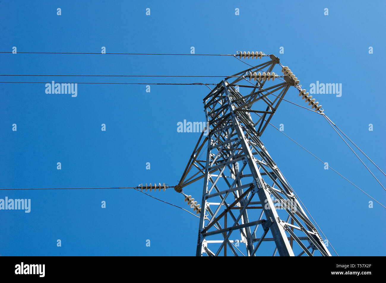 This image shows a power line tower Stock Photo - Alamy