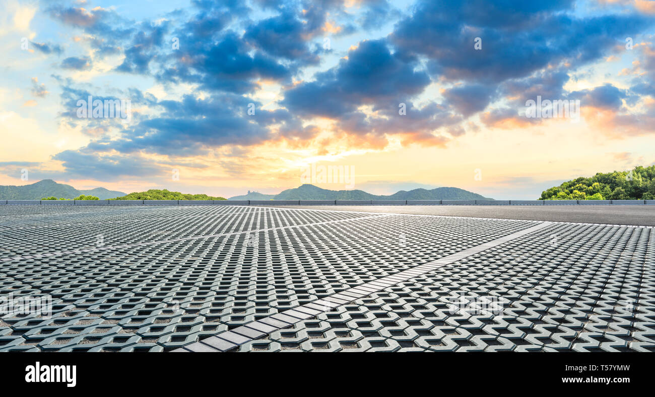 Rough square floor and green mountain with sky landscape Stock Photo ...