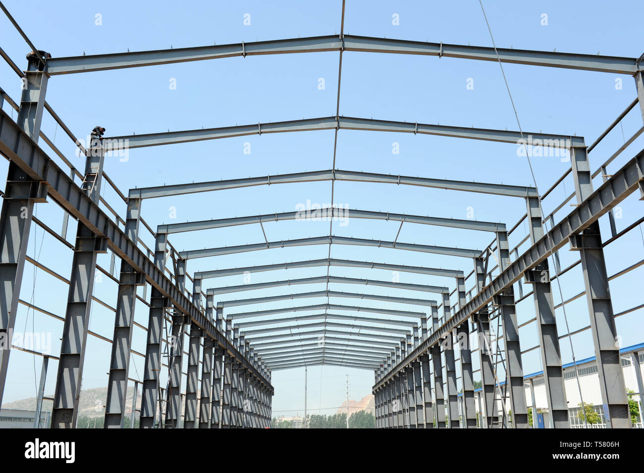 Steel frame factory building site Stock Photo - Alamy