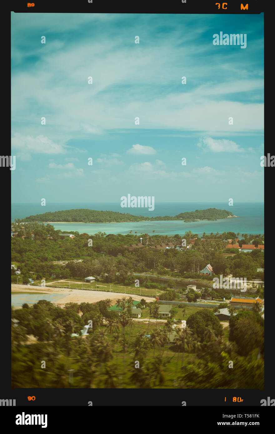 Small tropical island, retro film stylized Stock Photo - Alamy