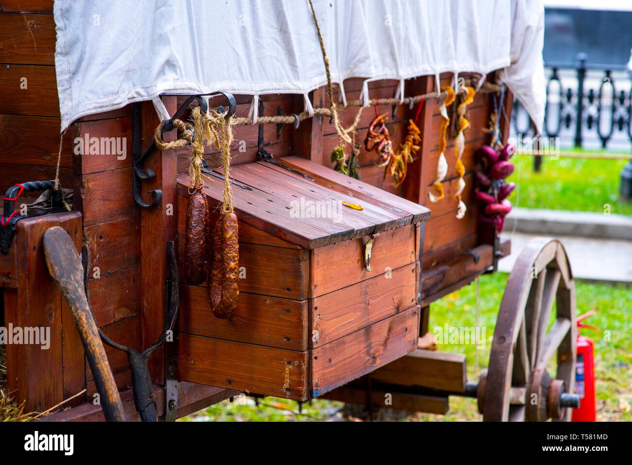 wooden cart with products in front of an old farm Stock Photo - Alamy