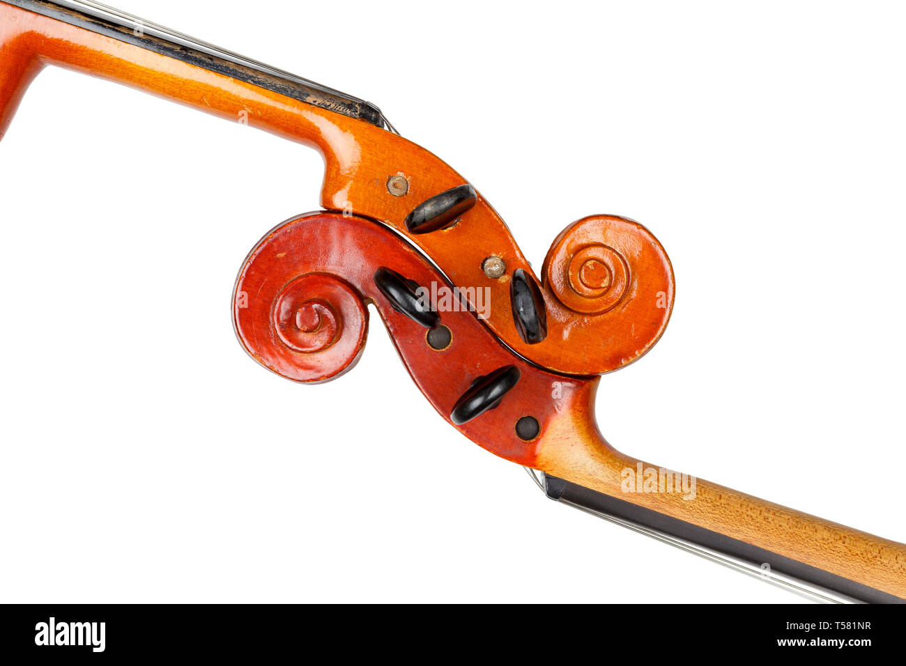 Vintage violin scrolls detail isolated on white Stock Photo - Alamy