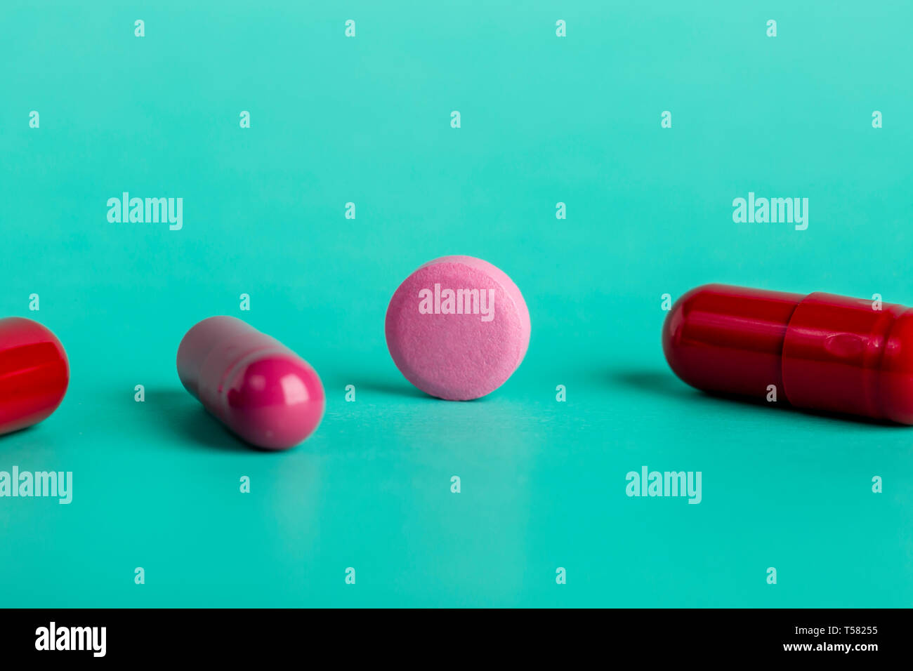 Different medicinal tablets and capsules Stock Photo - Alamy