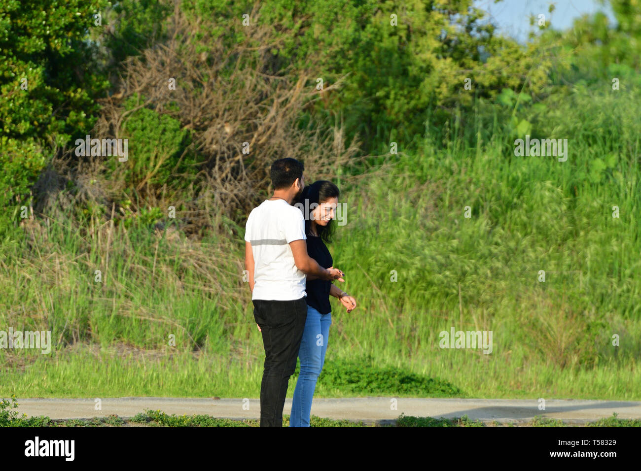 Couple evening stroll hi-res stock photography and images - Alamy