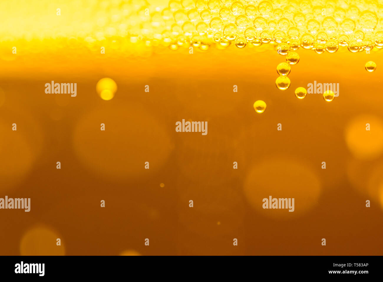 Macro shot of drops of beer inside a glass Stock Photo - Alamy