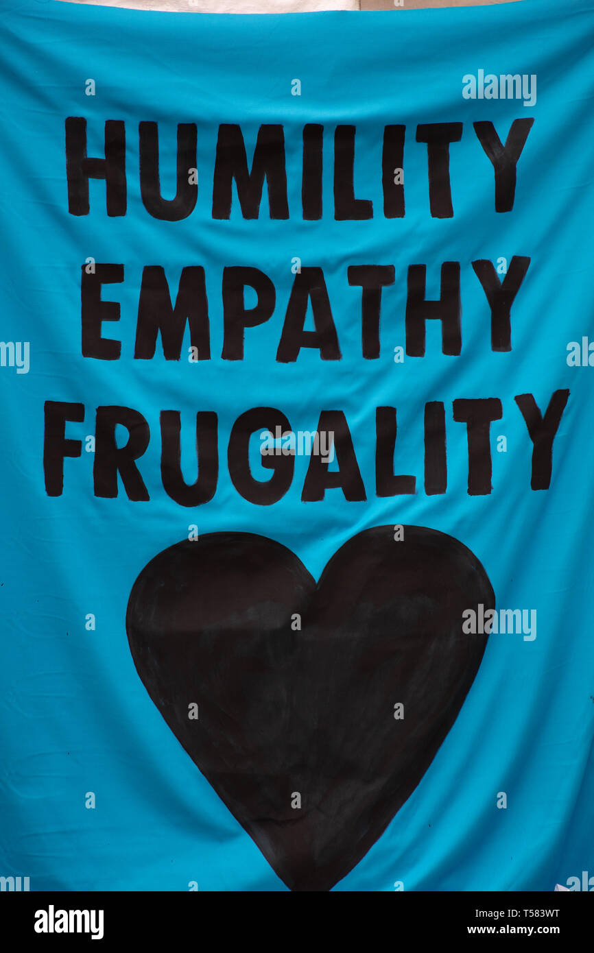 Close up of a banner saying humility empathy frugality seen during a ...