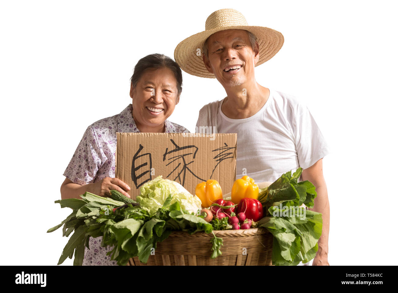 Peasant couple show their vegetables Stock Photo - Alamy