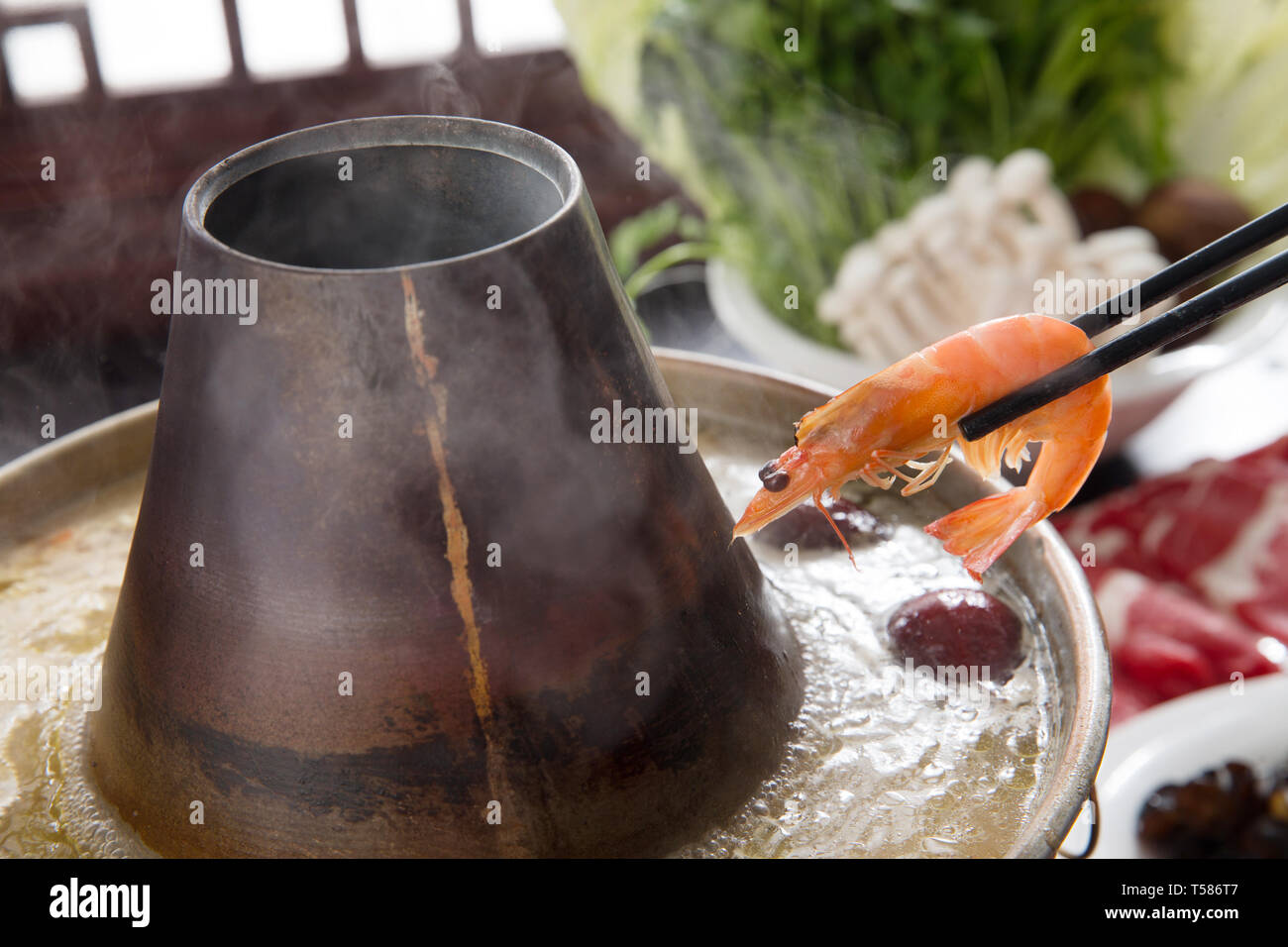Family eating hot pot hi-res stock photography and images - Alamy