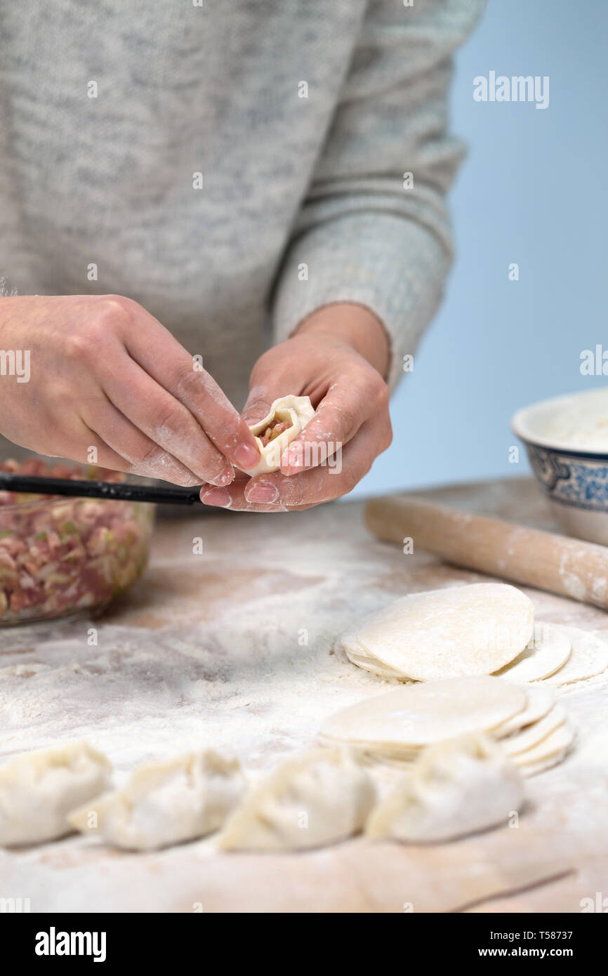 Asian person eating dumpling hi-res stock photography and images - Alamy