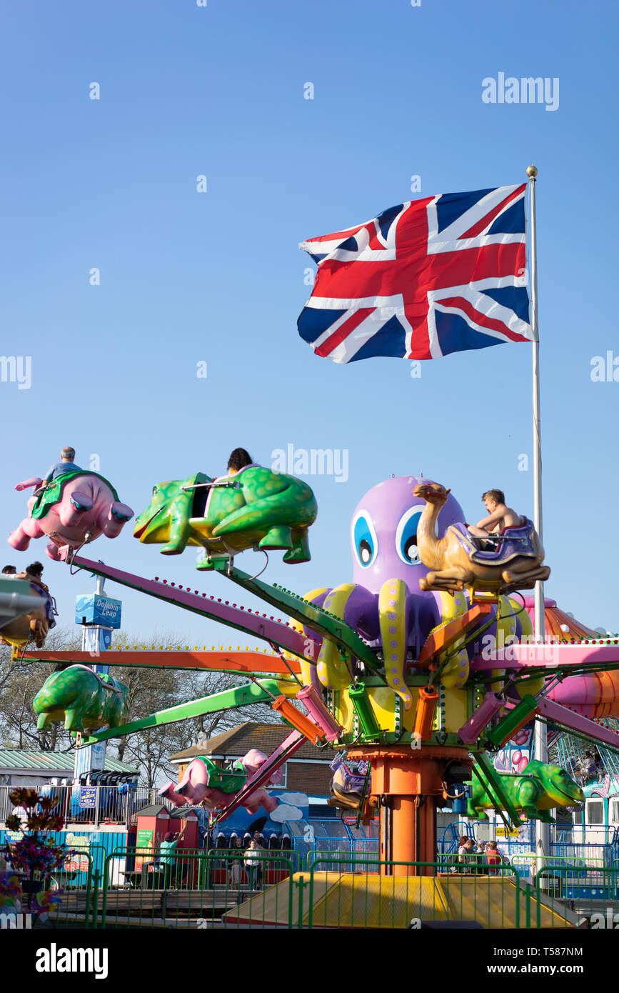 Funfair ride at Littlehampton amusement park in England on a summers ...