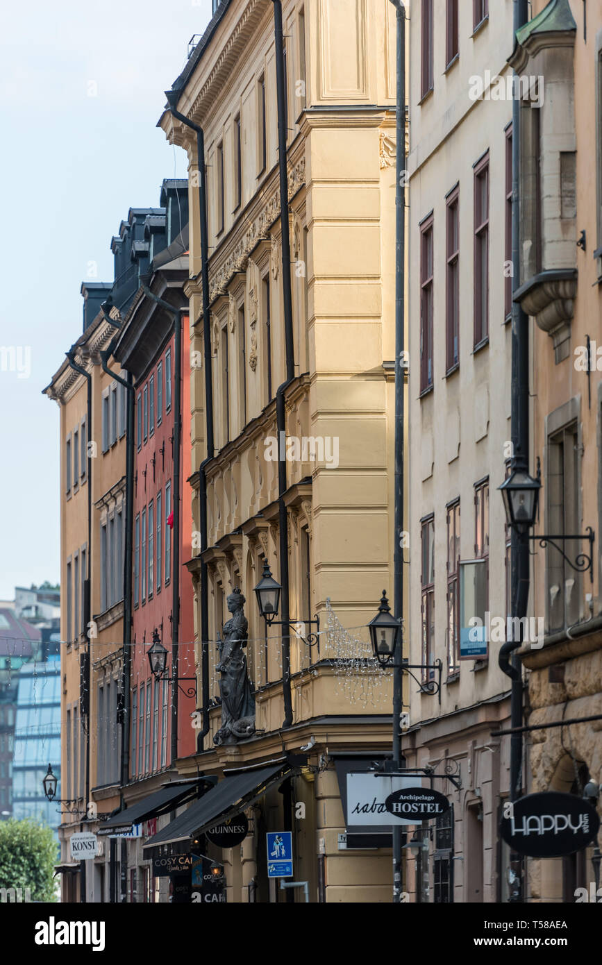 Colourful historic buildings line the narrow streets of Stockholm's ...