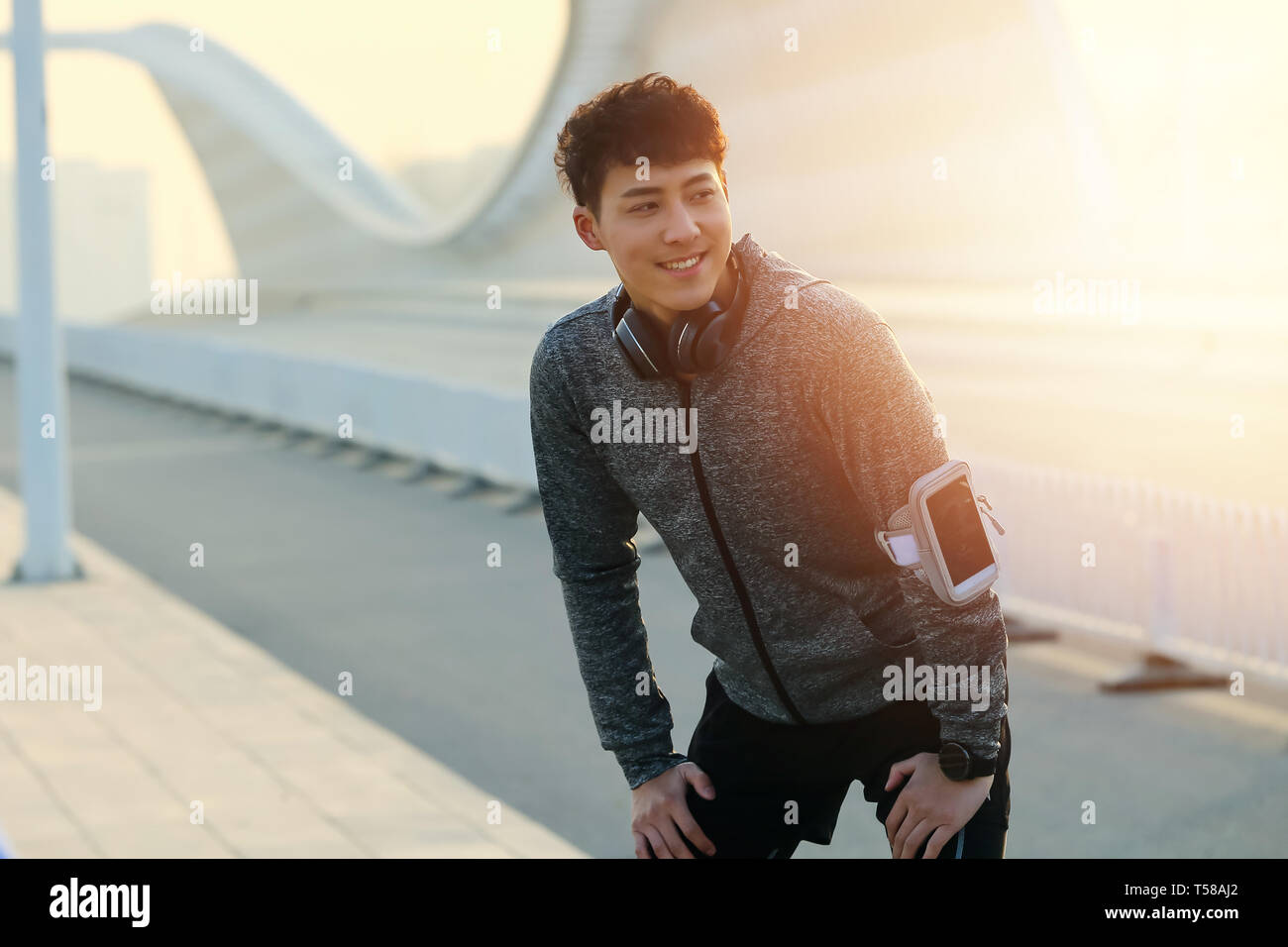 Asian jogging on track hi-res stock photography and images - Alamy