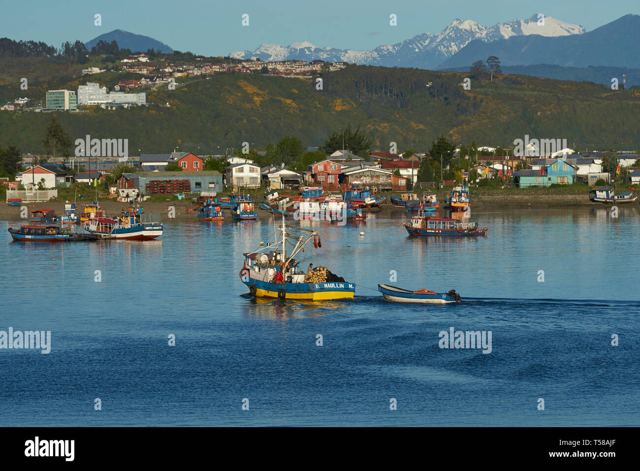 Fishing boat in the busy port of Puerto Montt in Southern Chile Stock ...